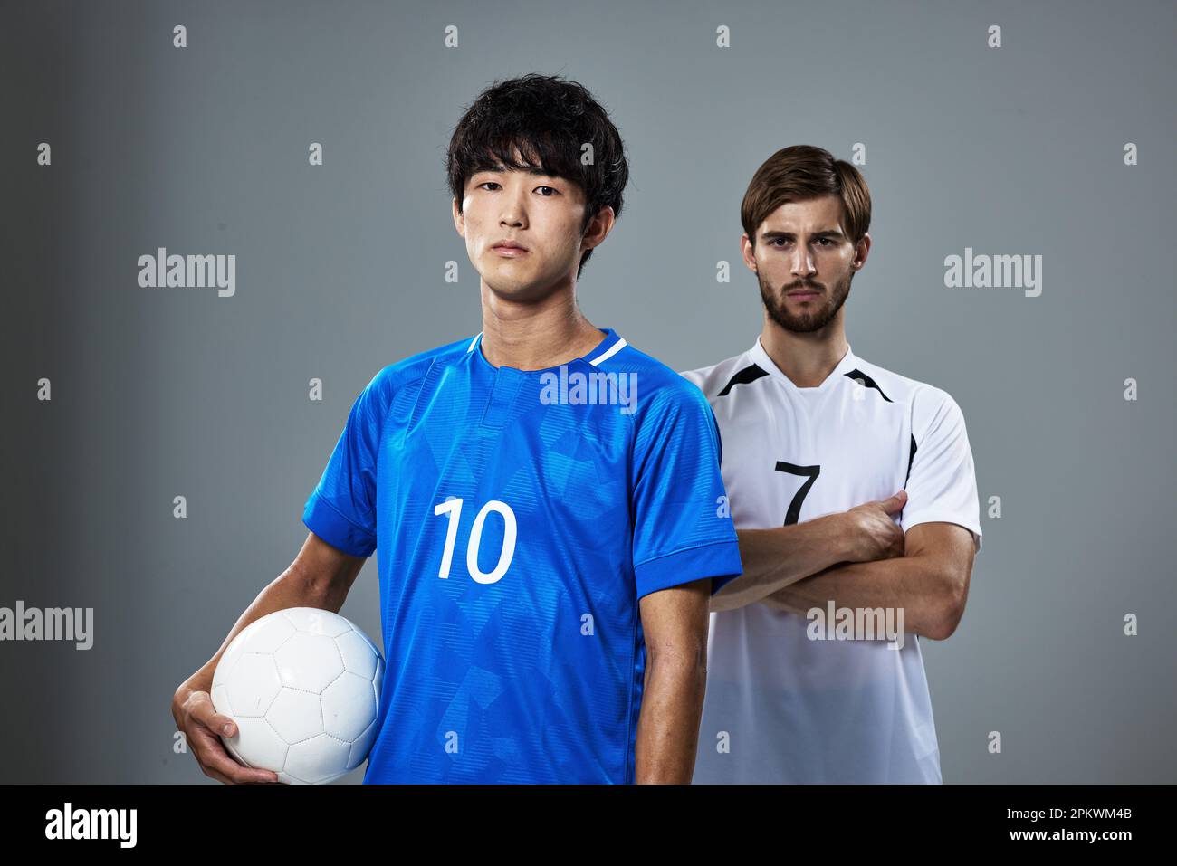 Soccer players studio portrait Stock Photo - Alamy