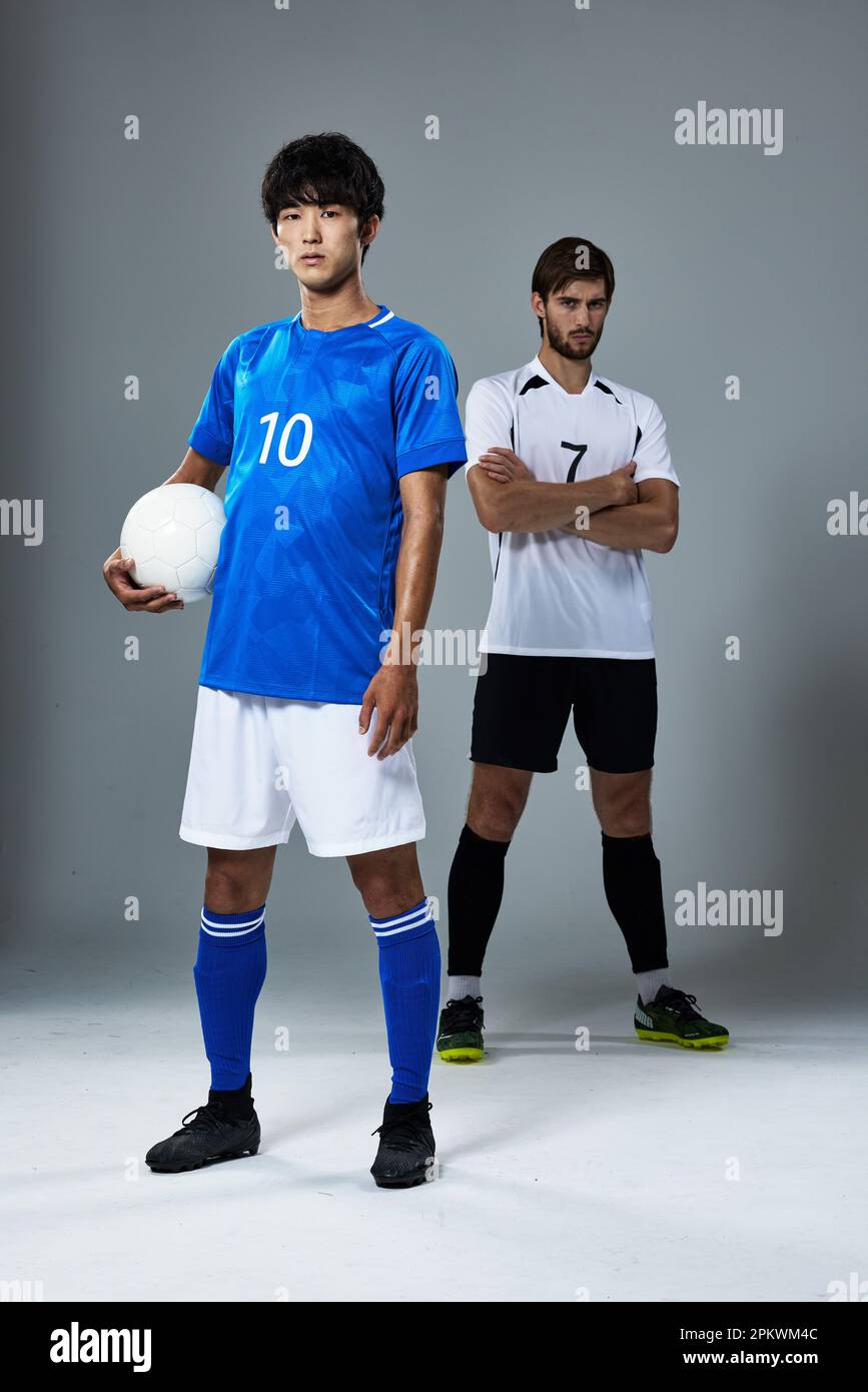 Soccer players studio portrait Stock Photo - Alamy