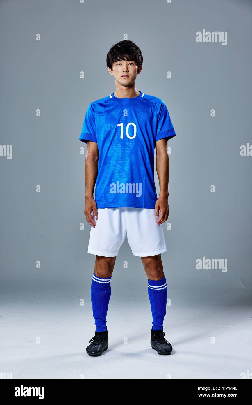 Soccer player studio portrait Stock Photo - Alamy