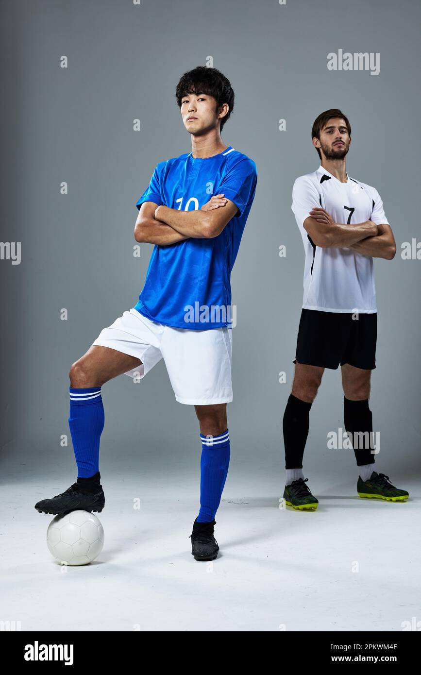 Soccer players studio portrait Stock Photo - Alamy
