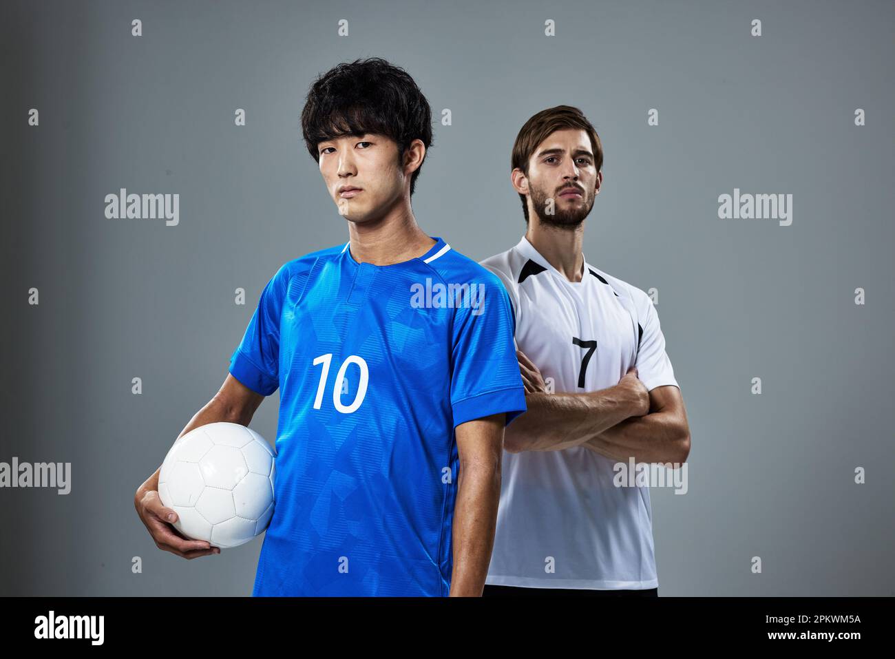 Soccer players studio portrait Stock Photo - Alamy