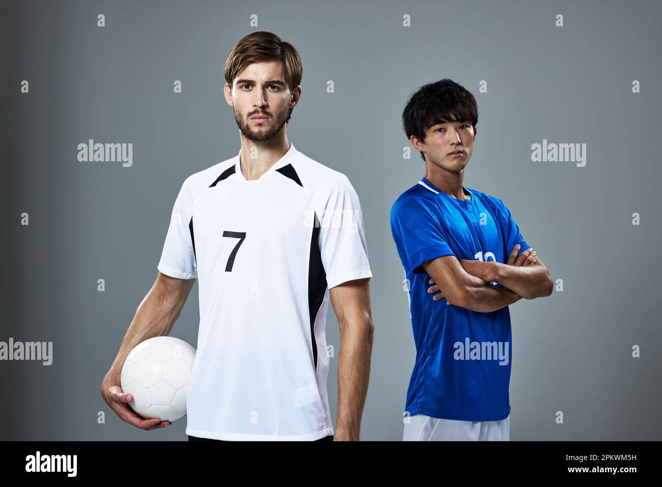 Soccer players studio portrait Stock Photo - Alamy