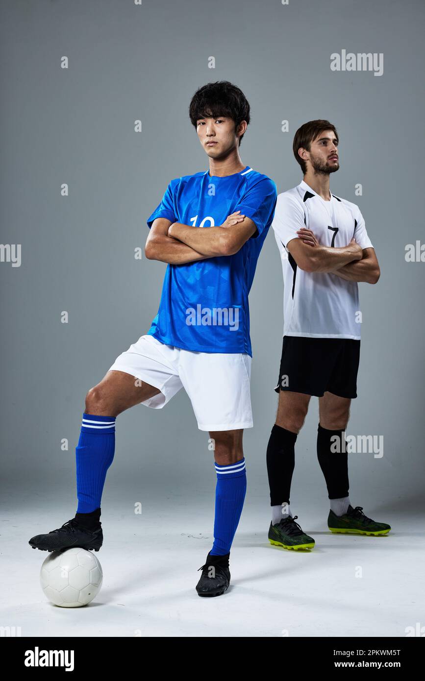 Soccer players studio portrait Stock Photo - Alamy