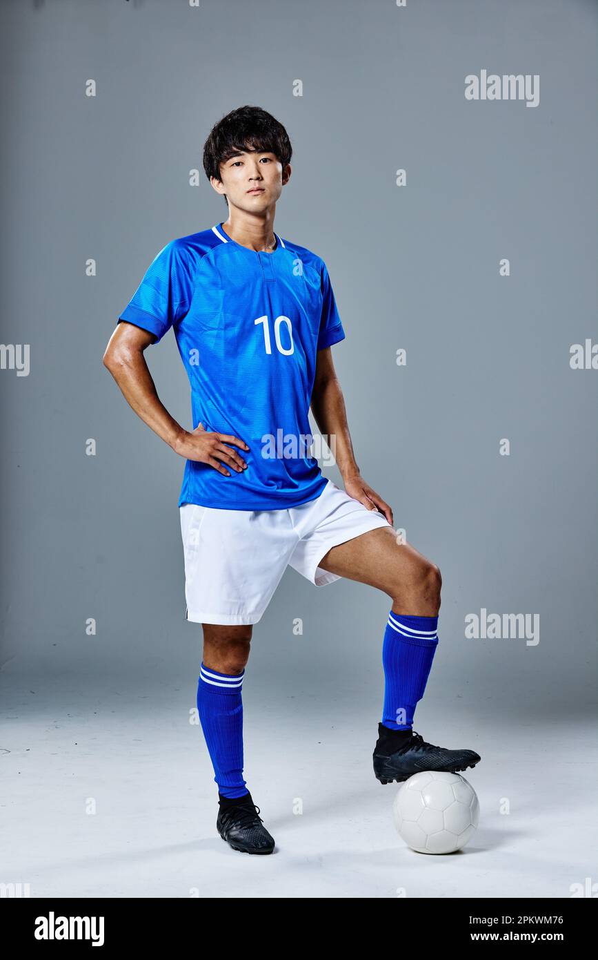 Soccer player studio portrait Stock Photo - Alamy