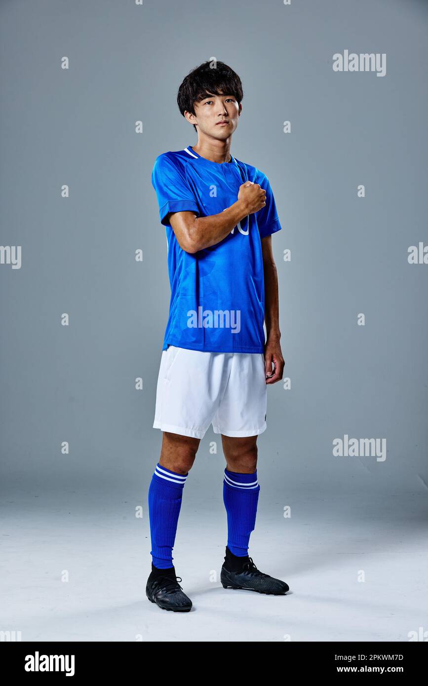 Soccer player studio portrait Stock Photo - Alamy