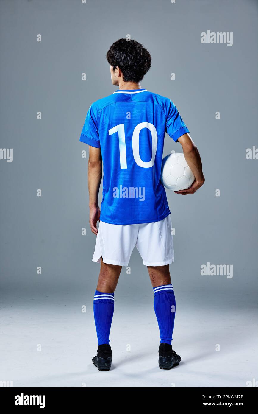 Soccer player studio portrait Stock Photo - Alamy