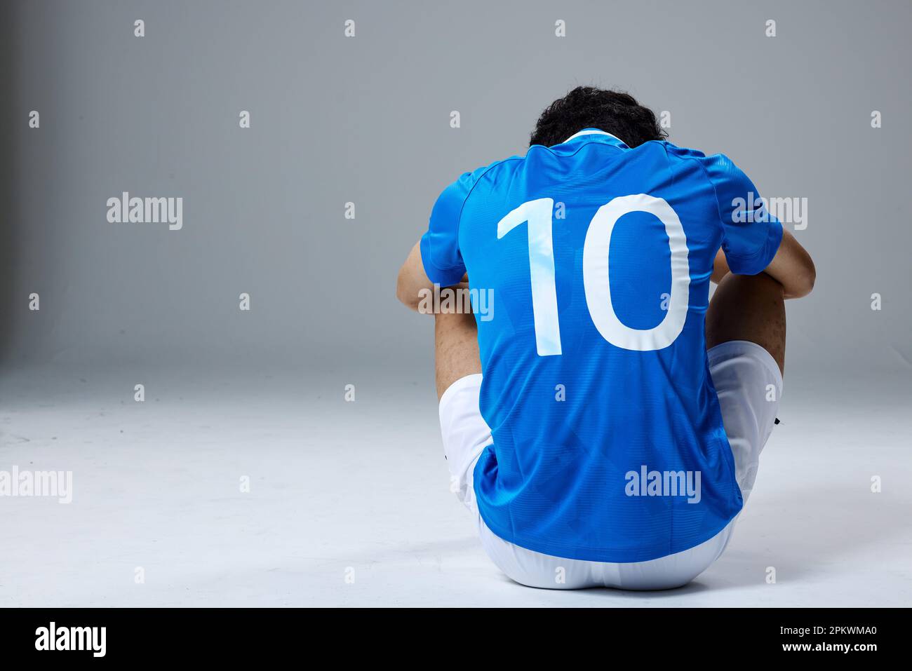 Soccer player studio portrait Stock Photo - Alamy