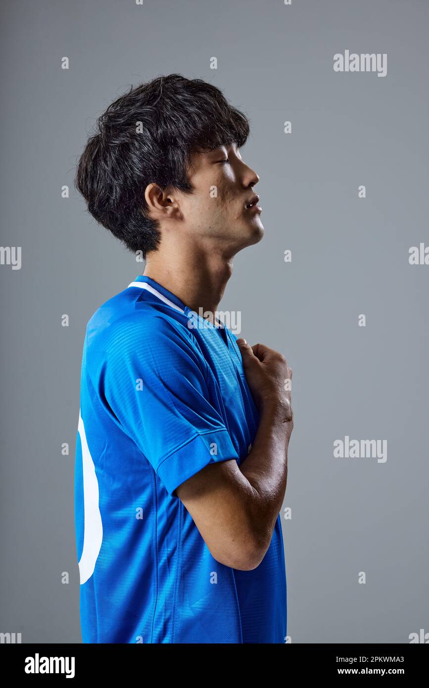 Soccer player studio portrait Stock Photo - Alamy