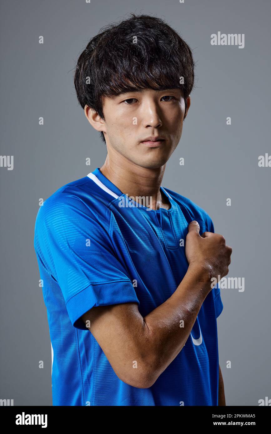 Soccer player studio portrait Stock Photo - Alamy