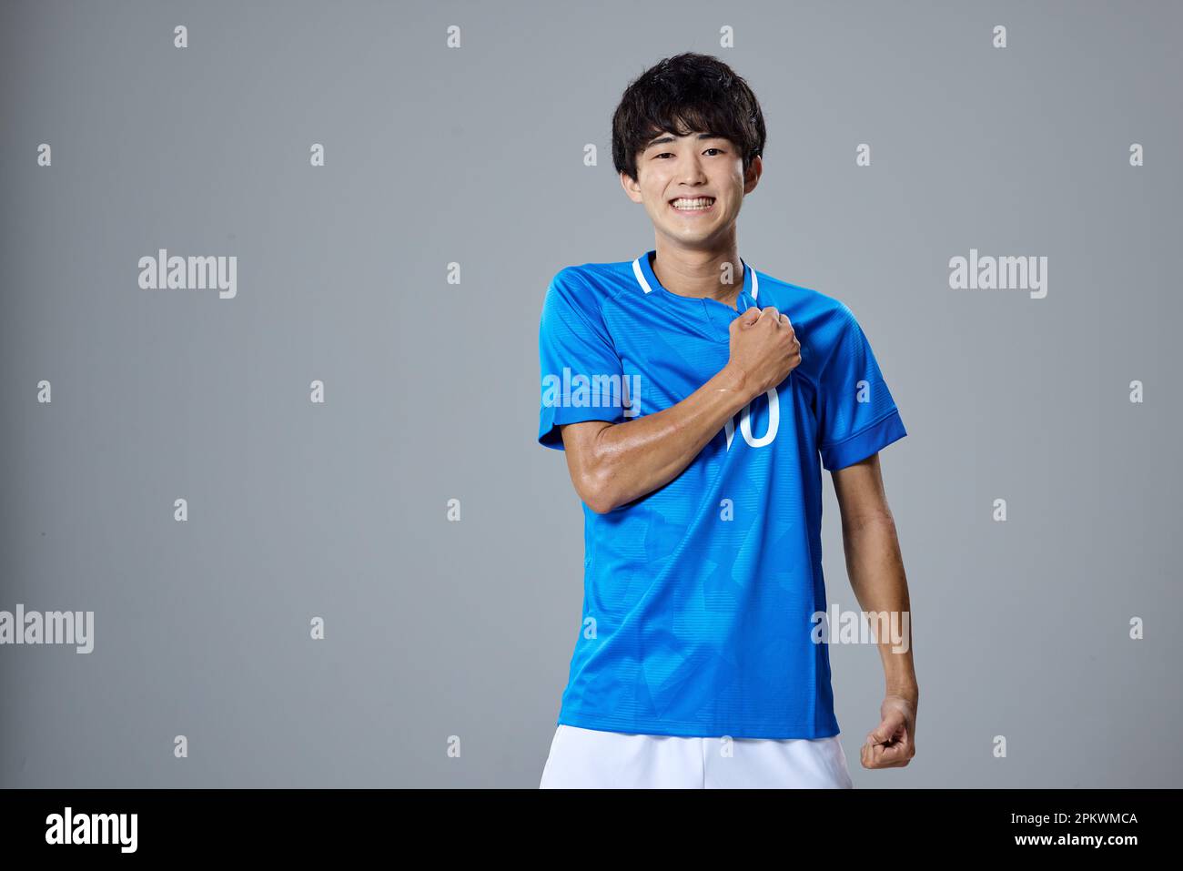 Soccer player studio portrait Stock Photo - Alamy