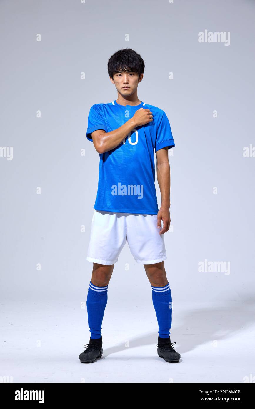 Soccer player studio portrait Stock Photo - Alamy