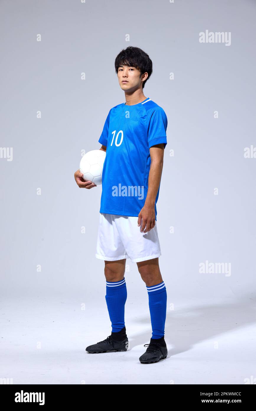 Soccer player studio portrait Stock Photo - Alamy