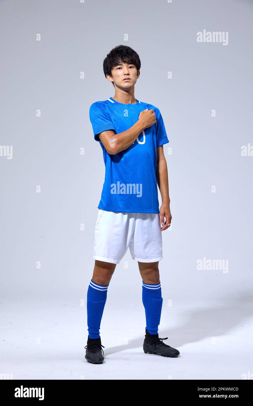 Soccer player studio portrait Stock Photo - Alamy