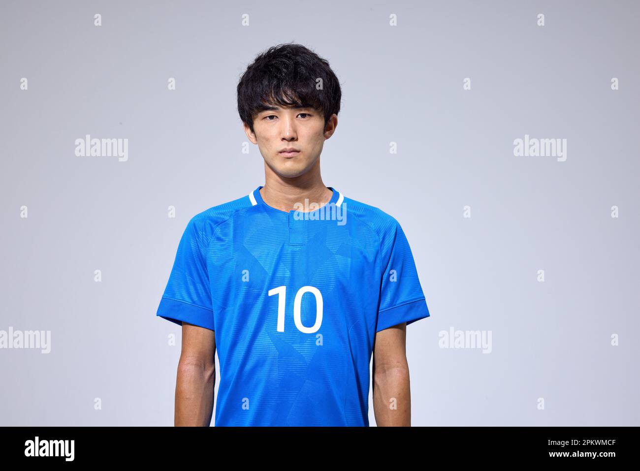 Soccer player studio portrait Stock Photo - Alamy