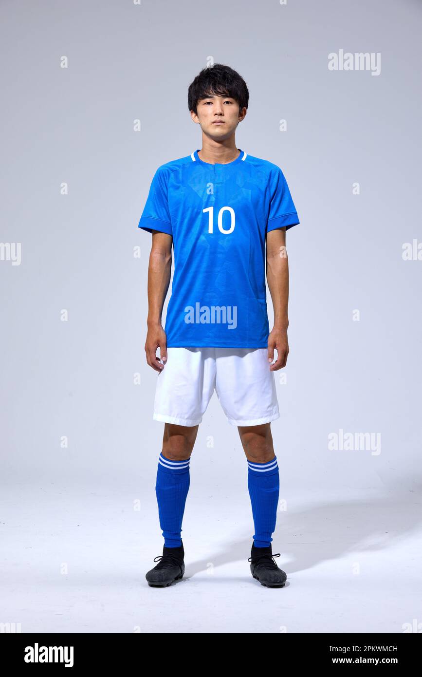 Soccer player studio portrait Stock Photo - Alamy