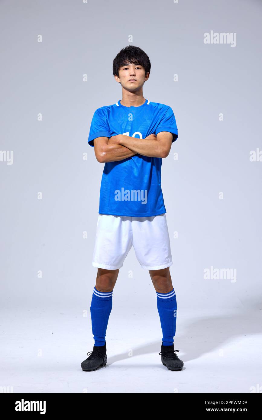 Soccer player studio portrait Stock Photo - Alamy