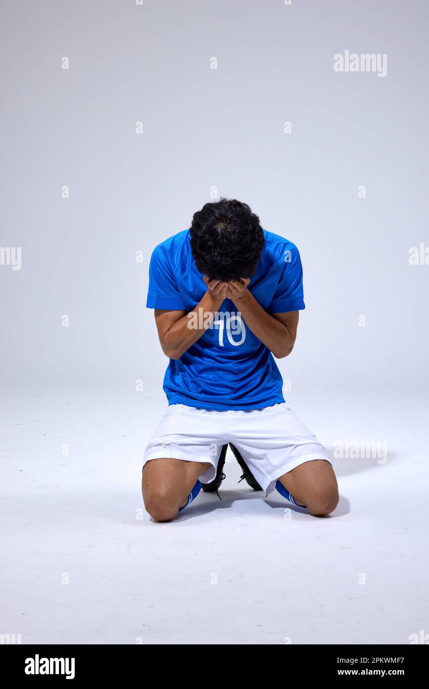 Soccer player studio portrait Stock Photo - Alamy