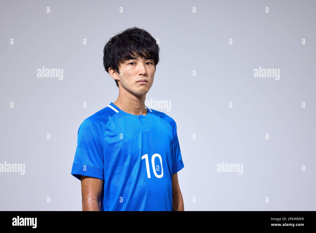 Soccer player studio portrait Stock Photo - Alamy