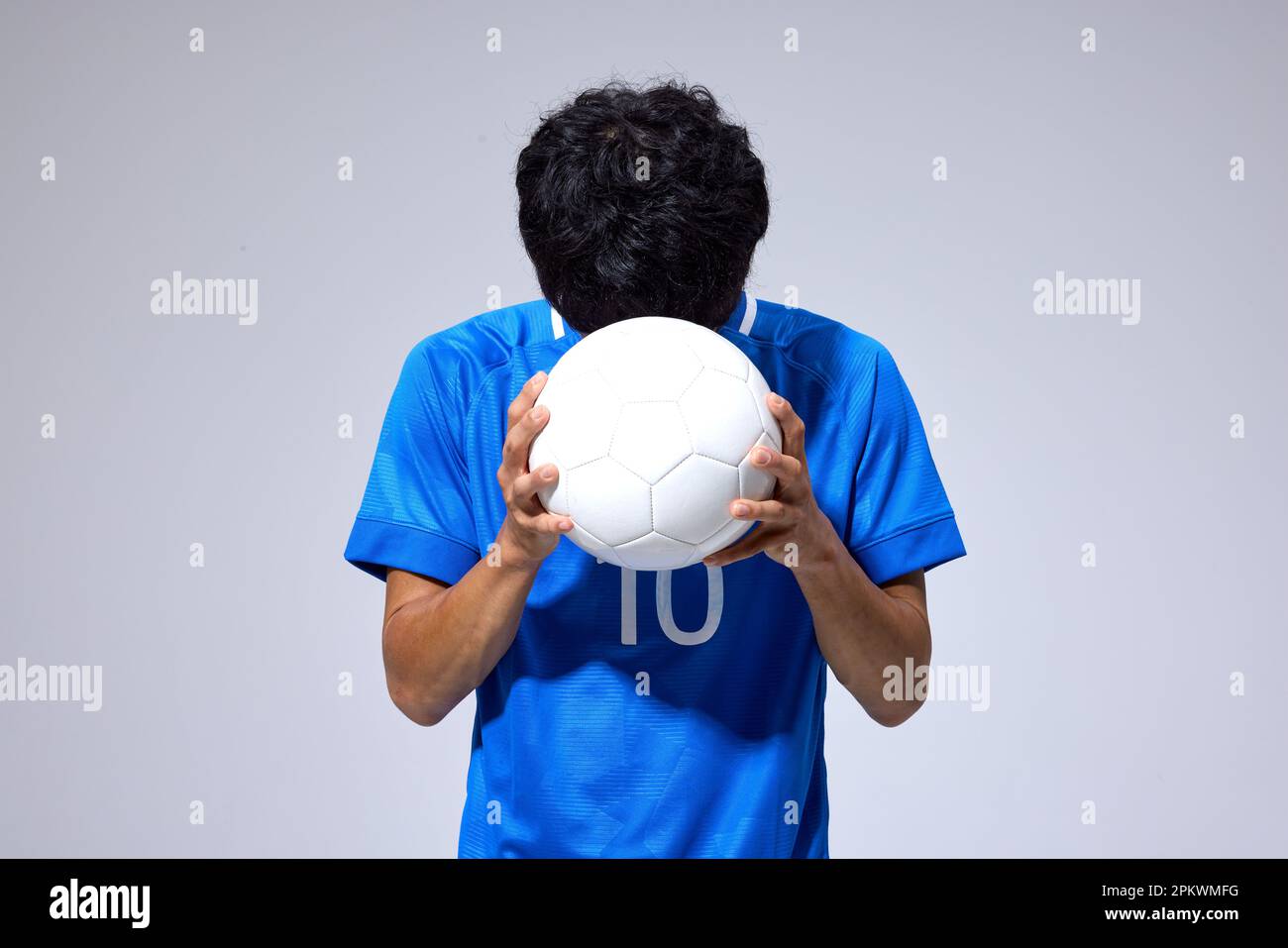 Soccer player studio portrait Stock Photo - Alamy