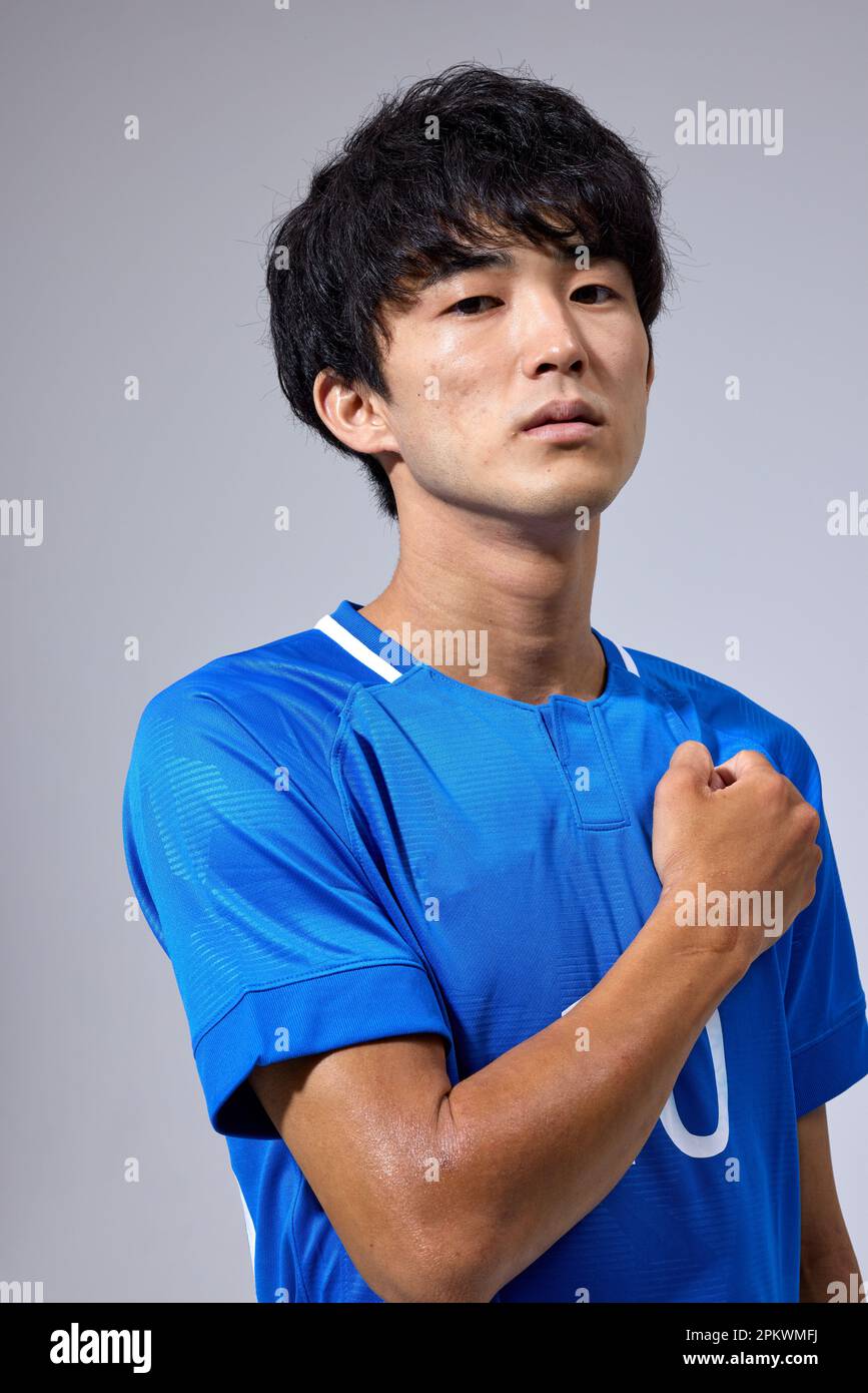 Soccer player studio portrait Stock Photo - Alamy