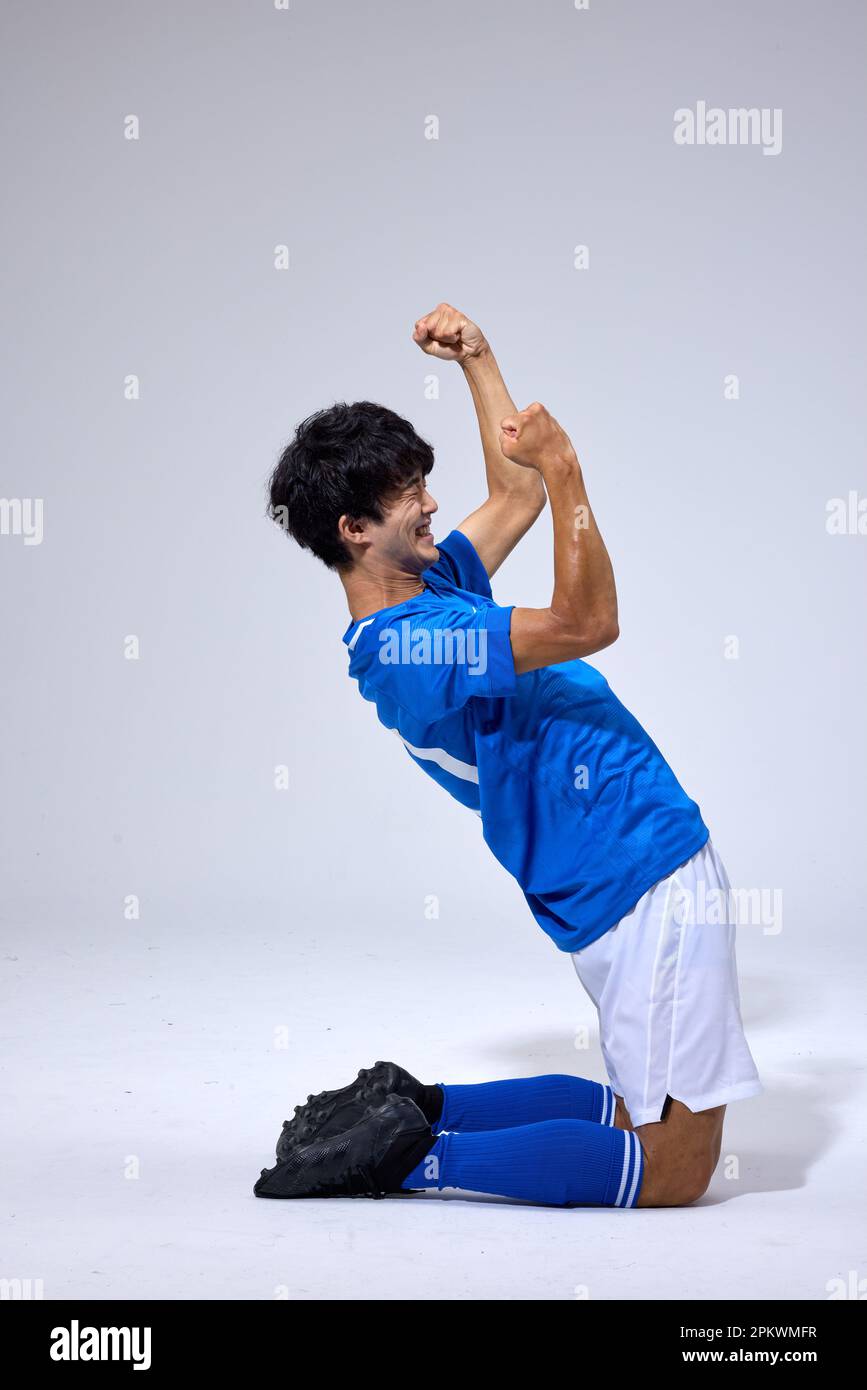 Soccer player studio portrait Stock Photo - Alamy