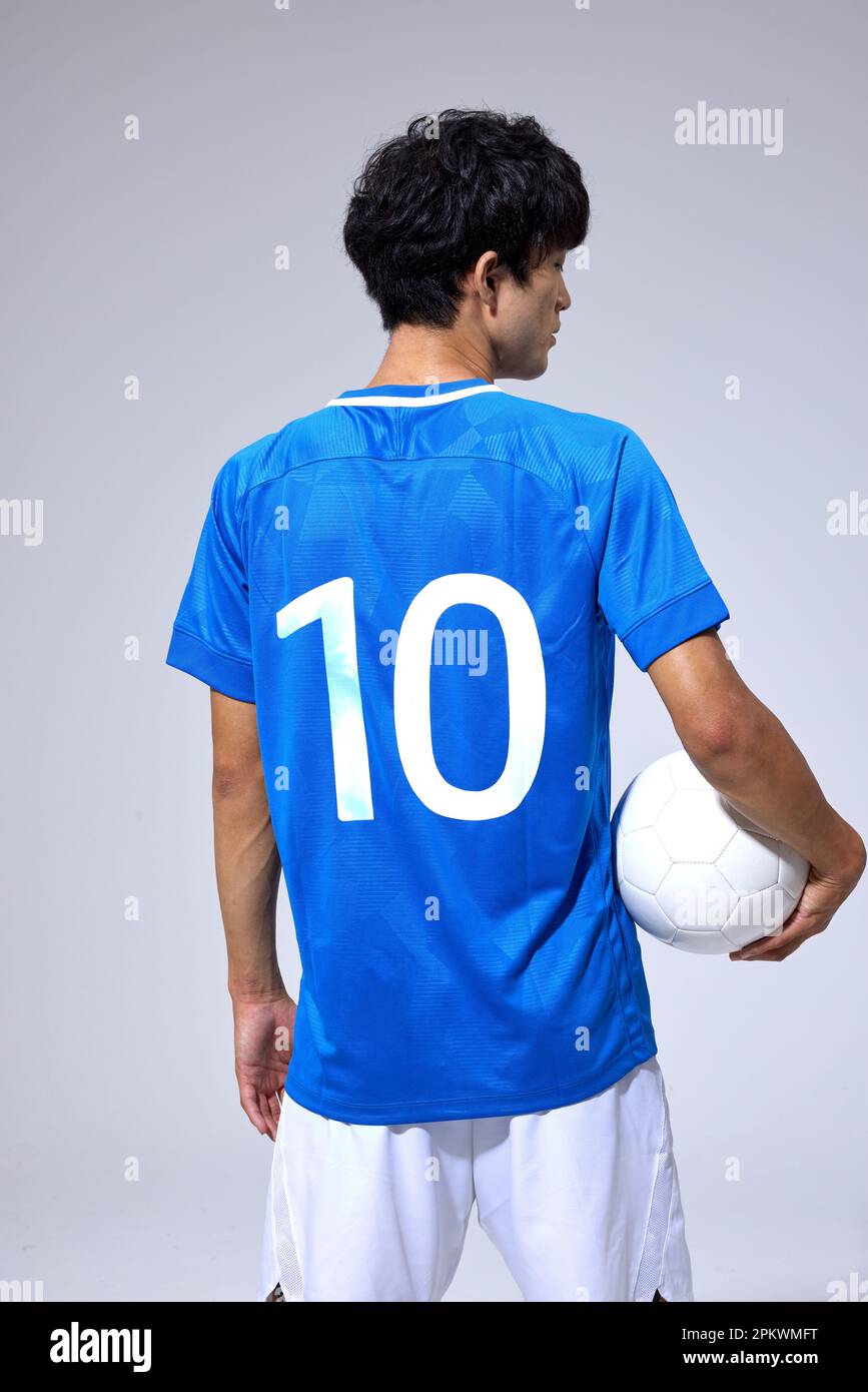 Soccer player studio portrait Stock Photo - Alamy