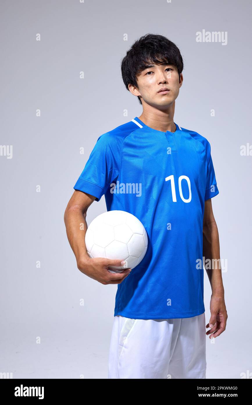 Soccer player studio portrait Stock Photo - Alamy