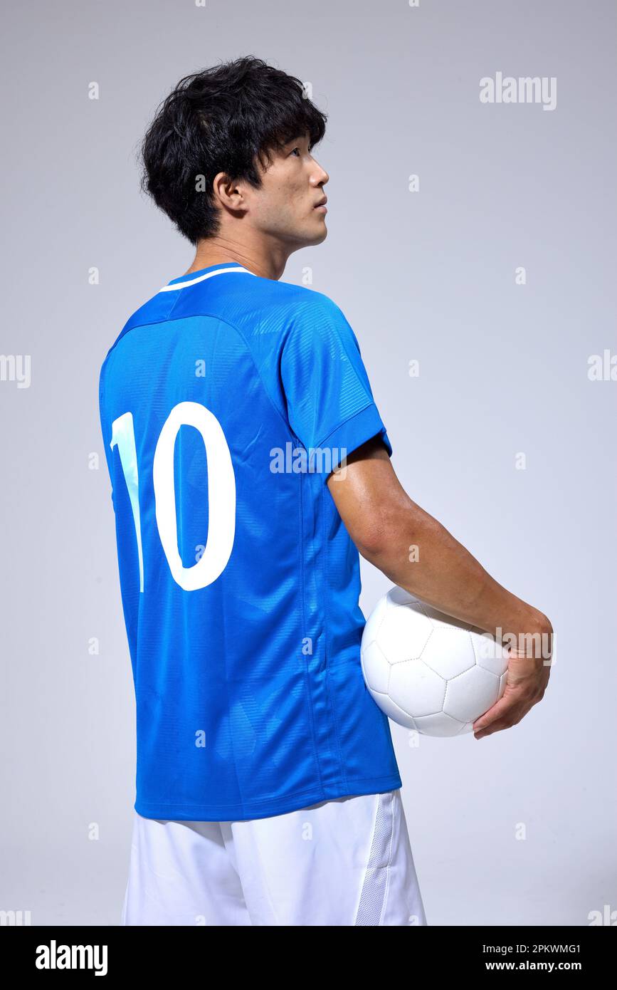 Soccer player studio portrait Stock Photo - Alamy
