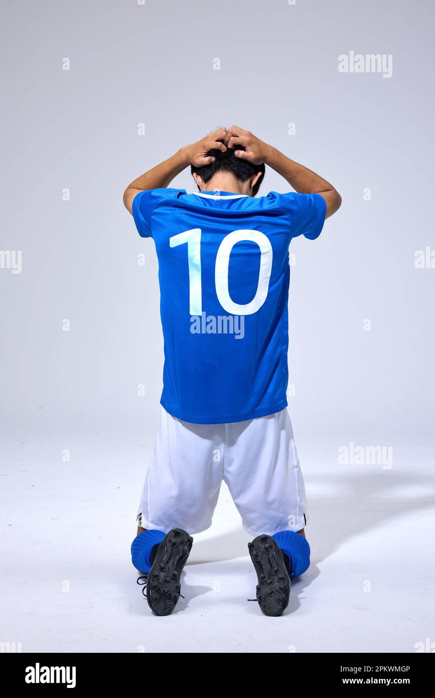 Soccer player studio portrait Stock Photo - Alamy