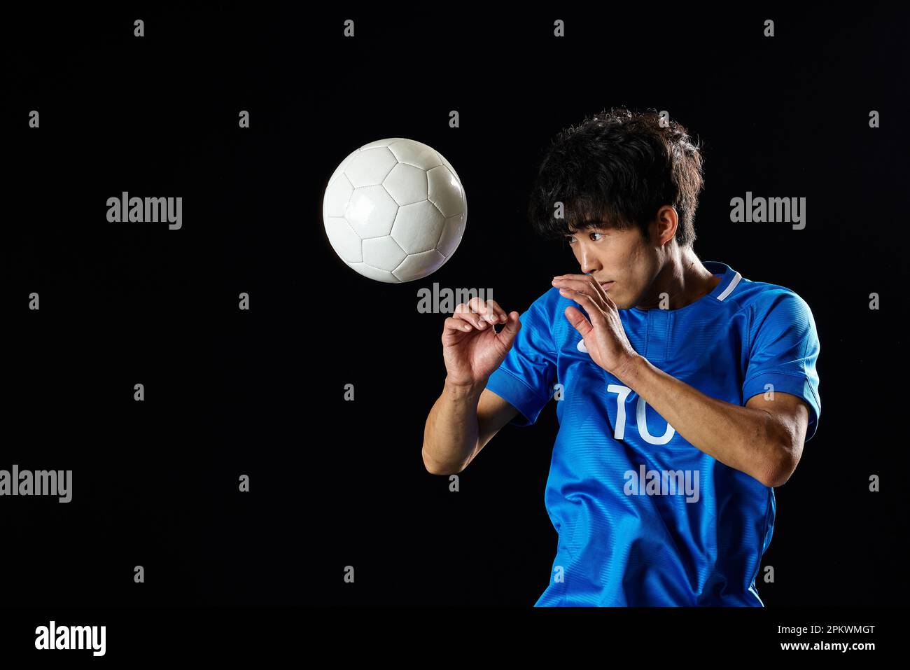 Soccer player studio portrait Stock Photo - Alamy