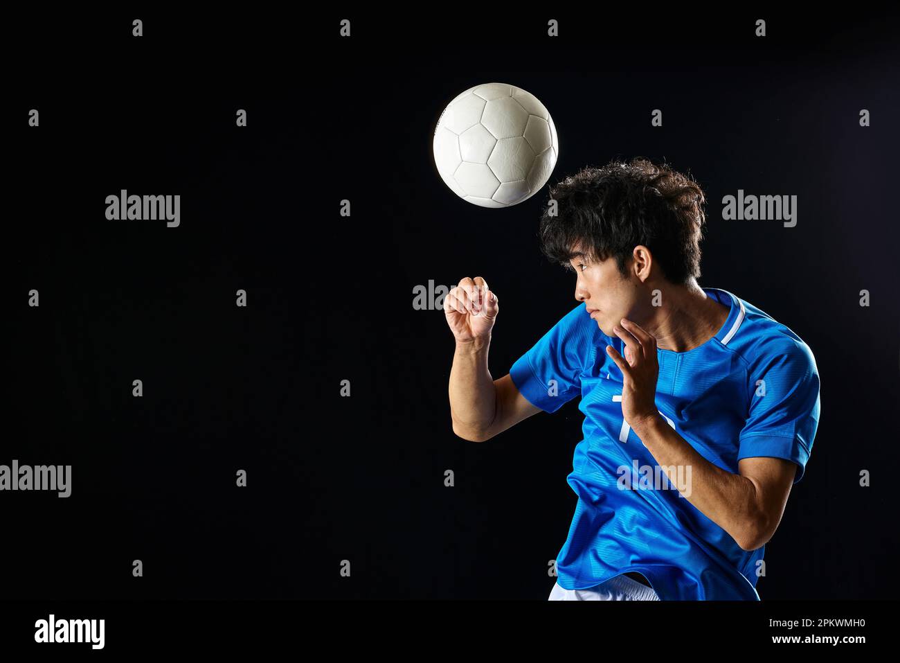 Soccer player studio portrait Stock Photo - Alamy