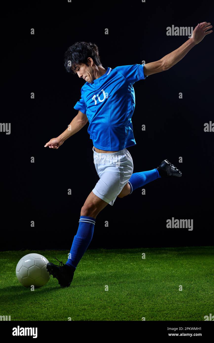 Soccer player studio portrait Stock Photo - Alamy