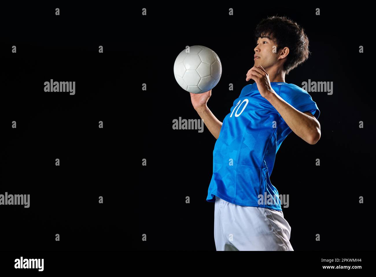 Soccer player studio portrait Stock Photo - Alamy