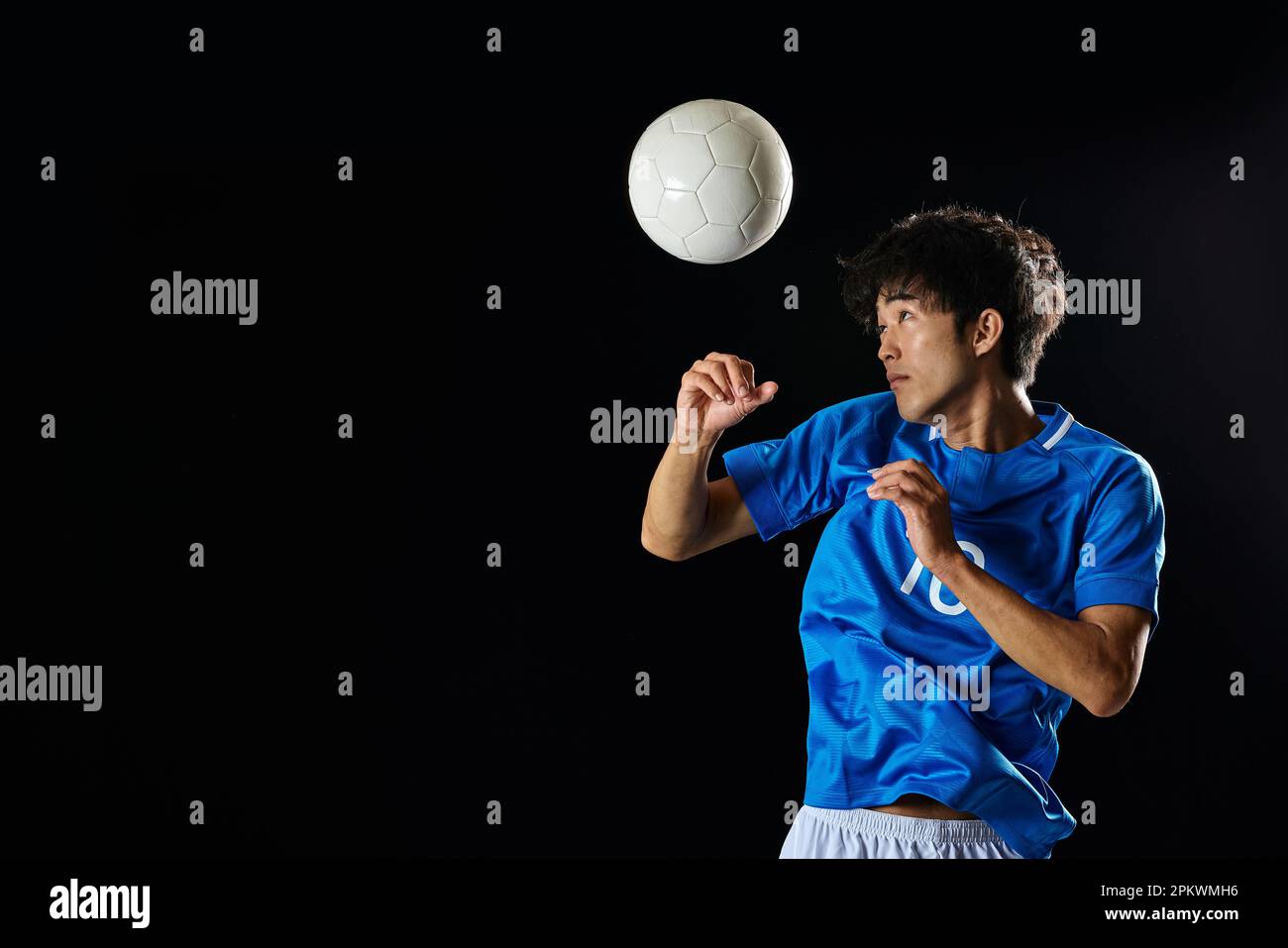 Soccer player studio portrait Stock Photo - Alamy