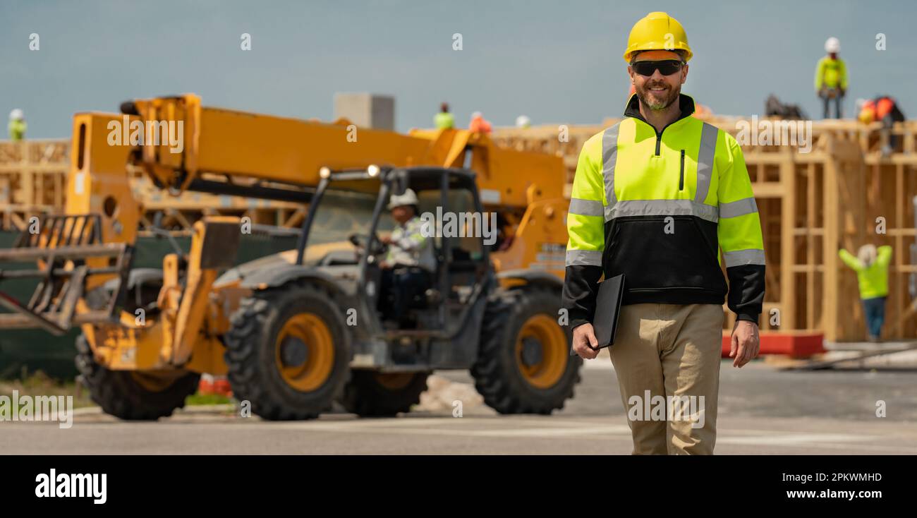 Worker with bulldozer on site construction. Man excavator worker ...