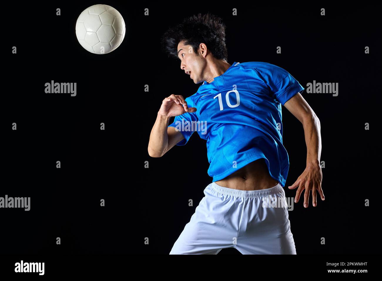 Soccer player studio portrait Stock Photo - Alamy
