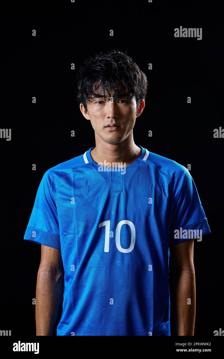 Soccer player studio portrait Stock Photo - Alamy