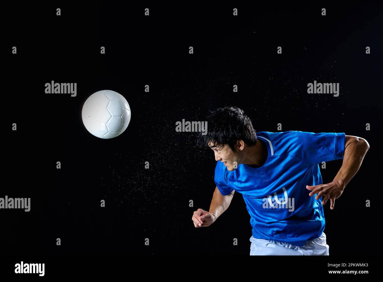 Soccer player studio portrait Stock Photo - Alamy