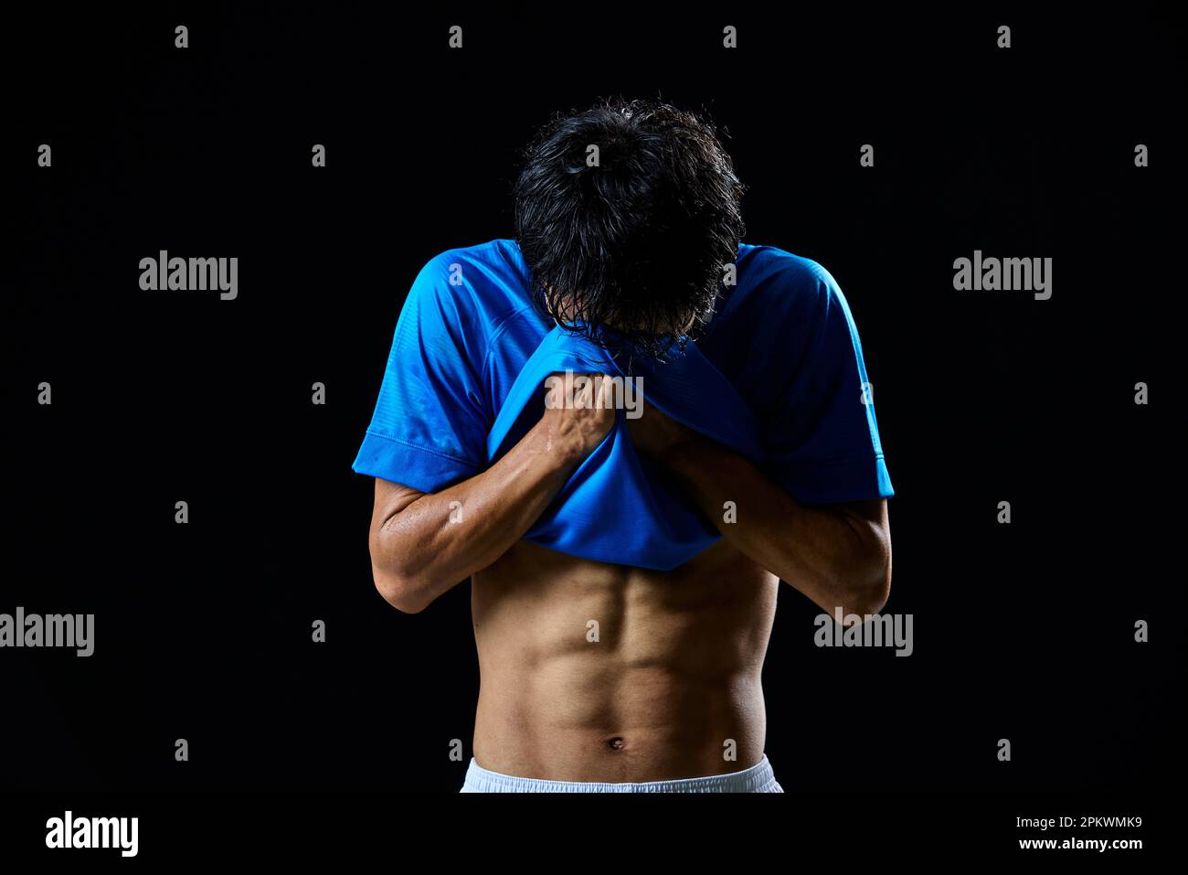 Soccer player studio portrait Stock Photo - Alamy