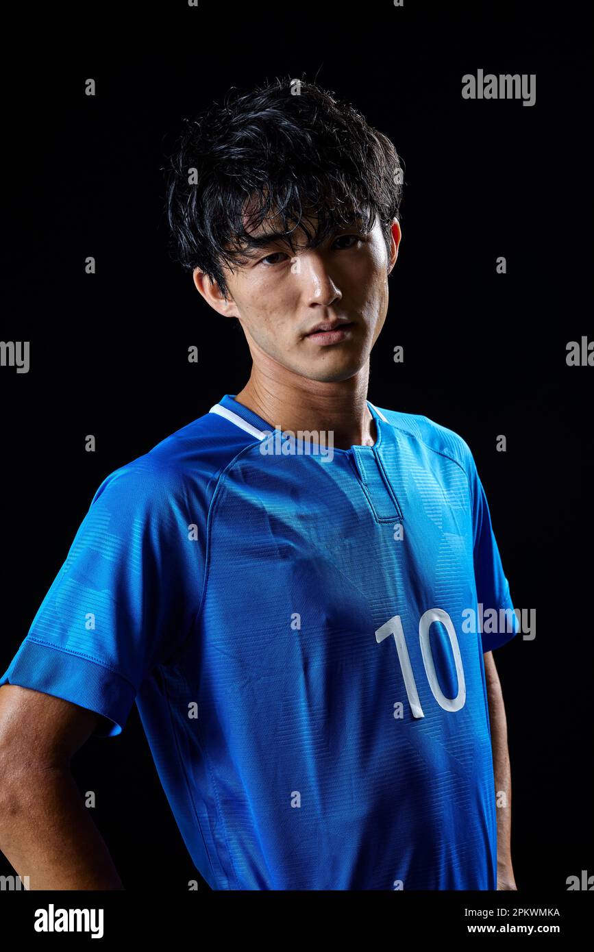 Soccer player studio portrait Stock Photo - Alamy