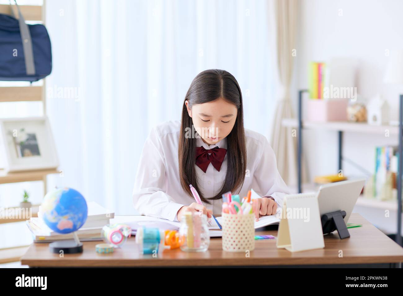 Japanese high school student in uniform studying Stock Photo - Alamy