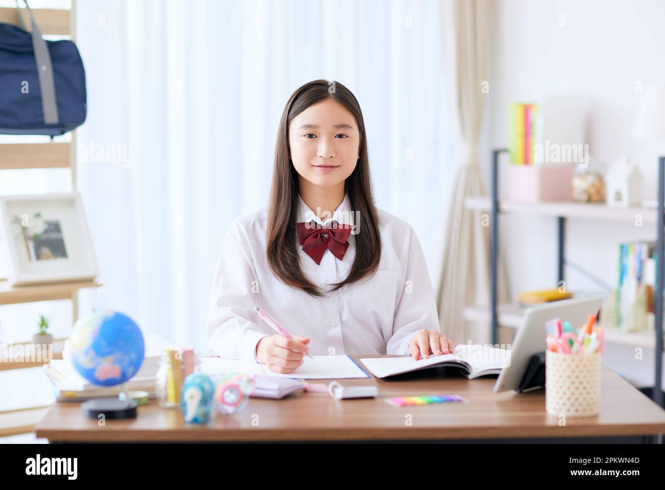 Japanese high school student in uniform studying Stock Photo - Alamy