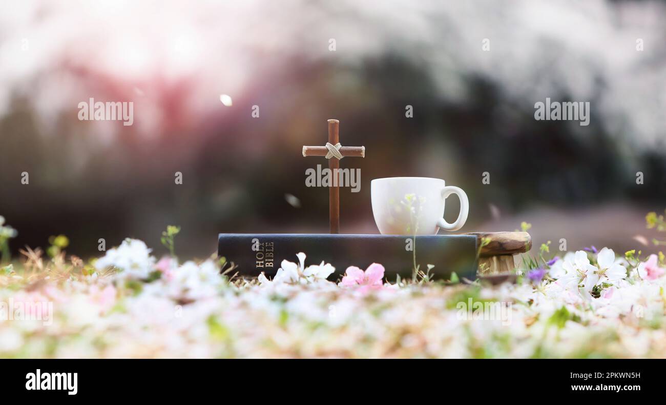 Spring background with the cross of Jesus Christ, the Bible and a ...