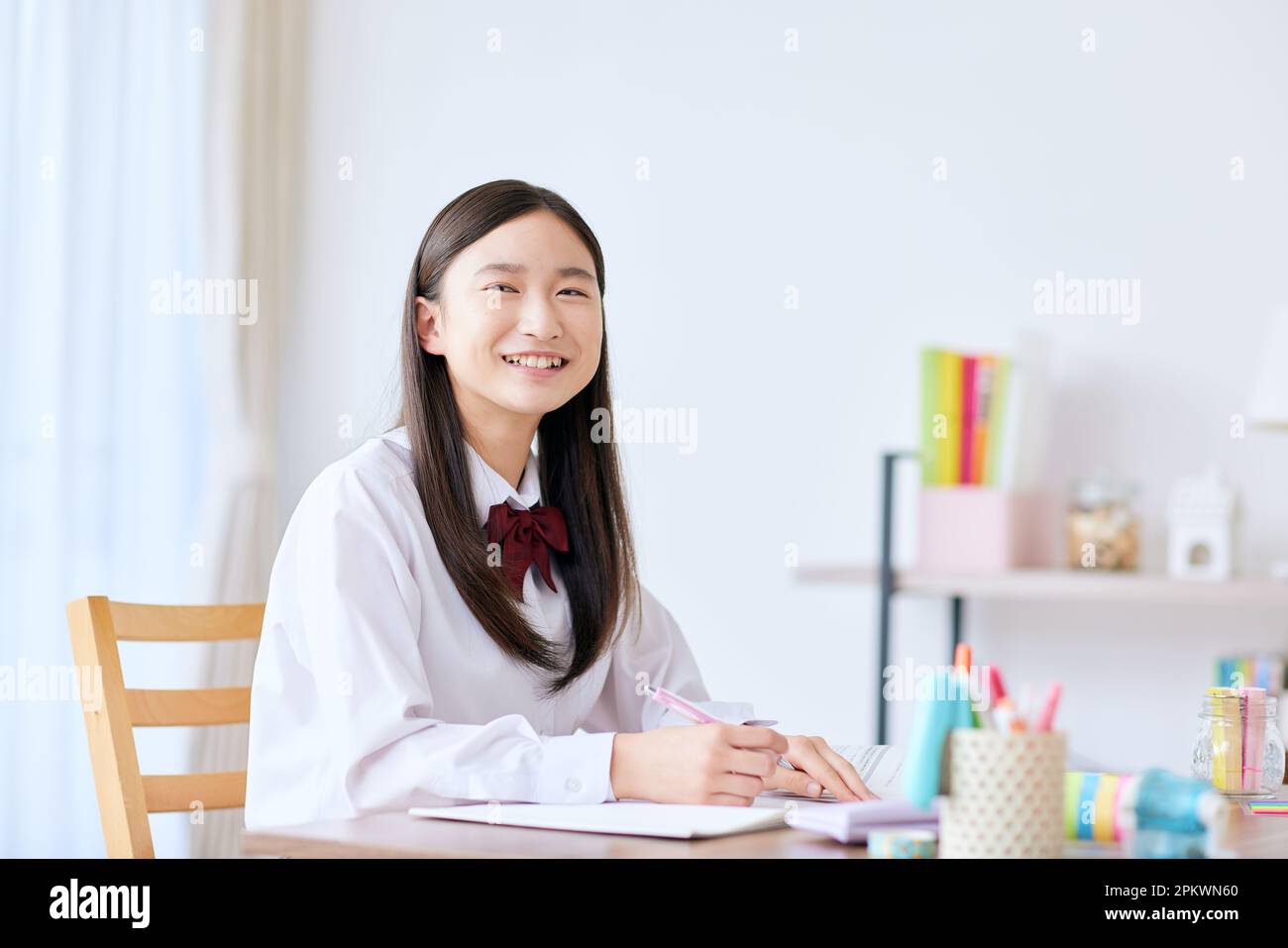 Japanese high school student in uniform studying Stock Photo - Alamy