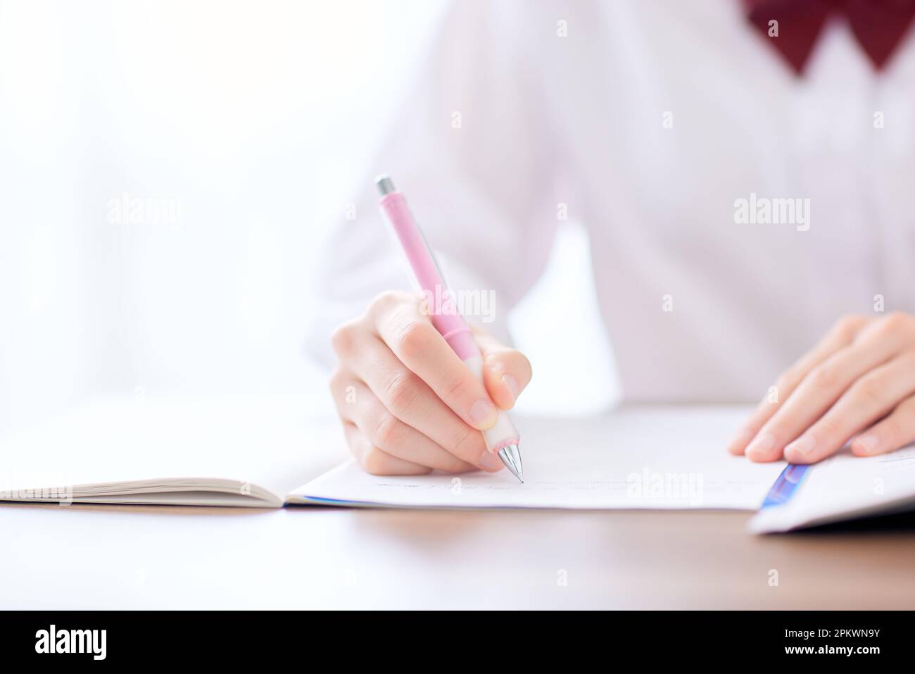 Japanese high school student in uniform studying Stock Photo - Alamy