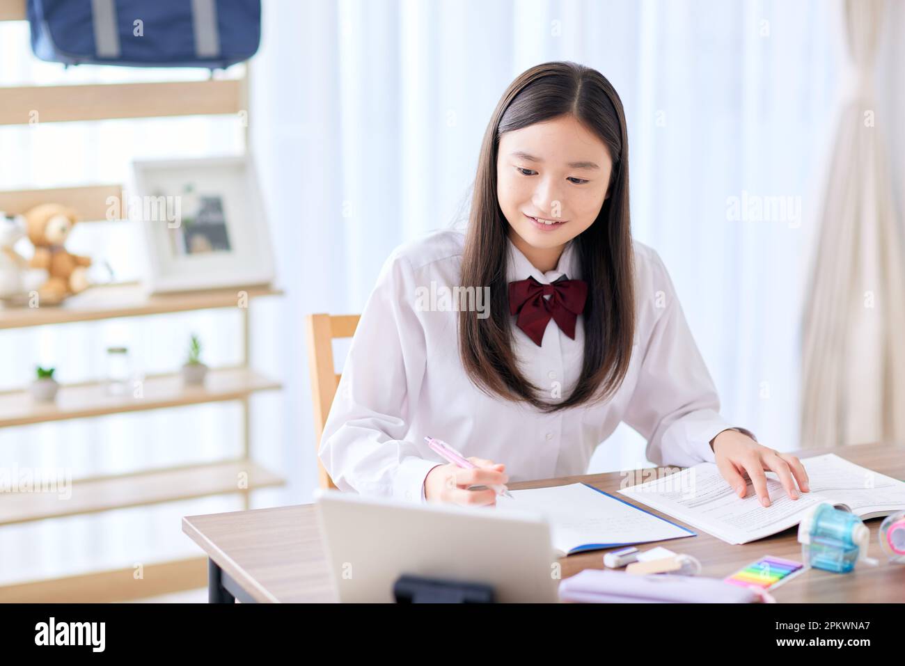 Japanese high school student in uniform studying Stock Photo - Alamy