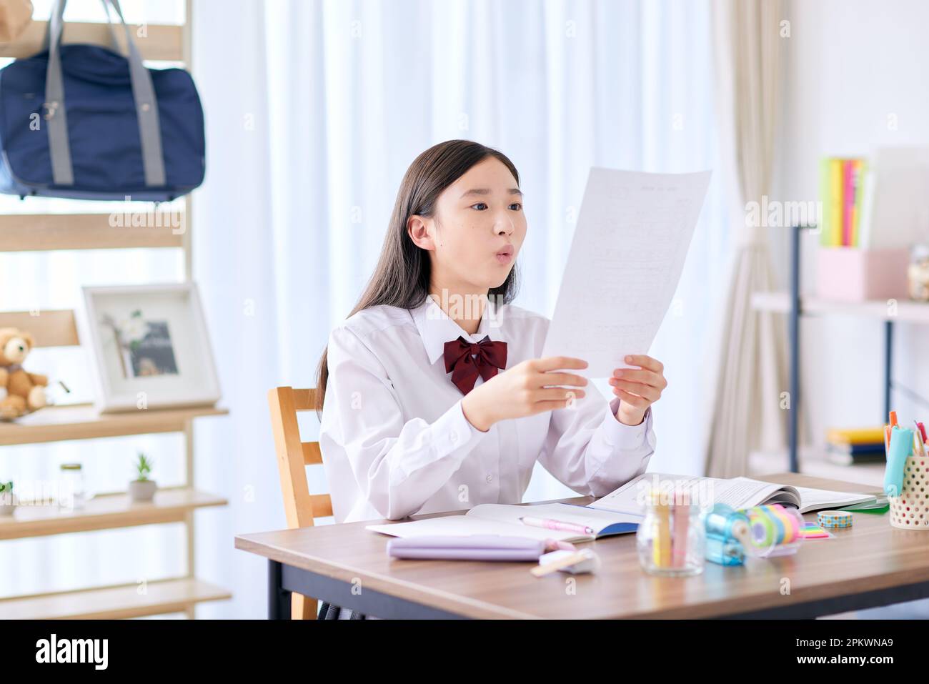 Japanese high school student in uniform studying Stock Photo - Alamy