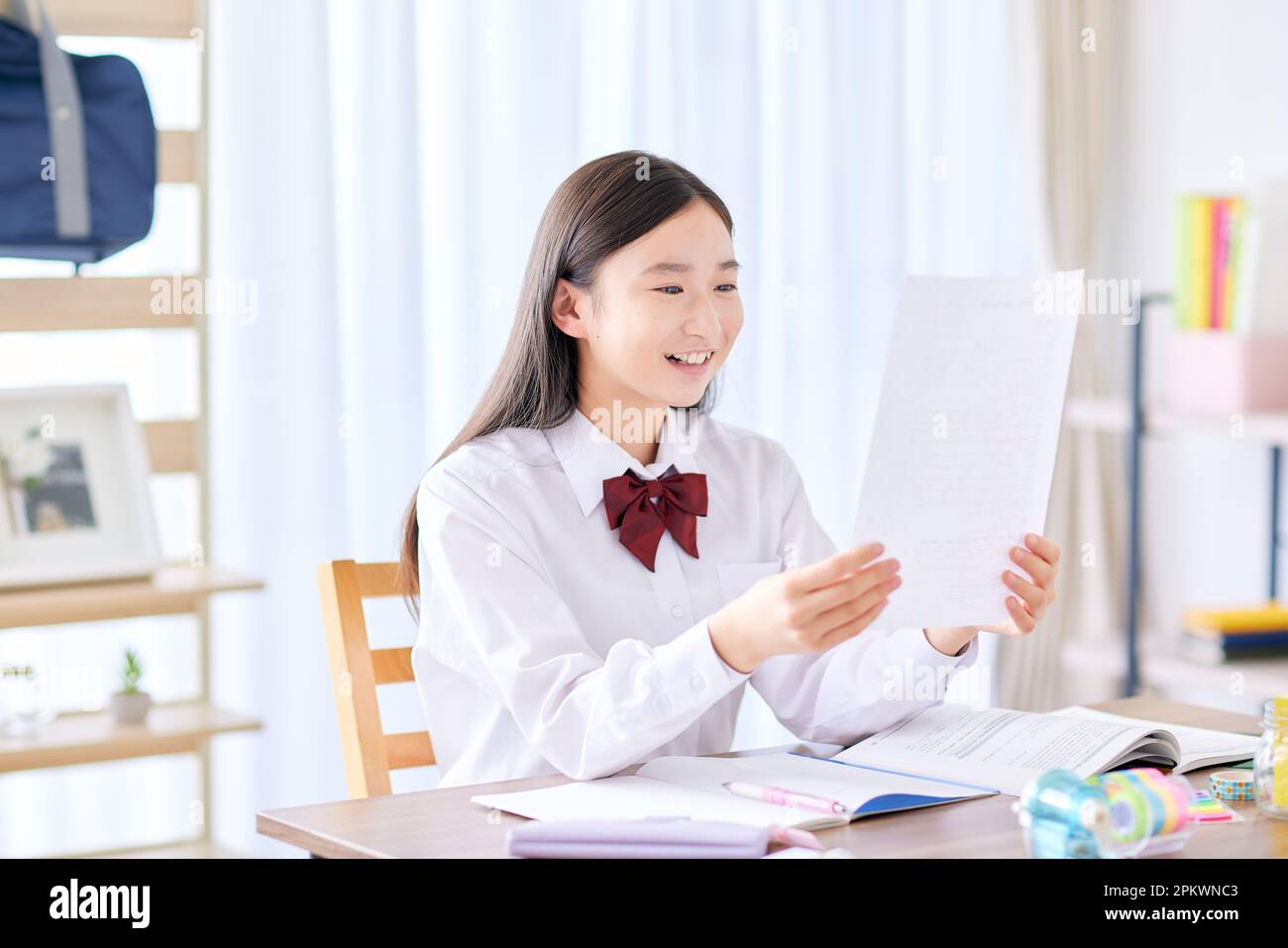Japanese high school student in uniform studying Stock Photo - Alamy