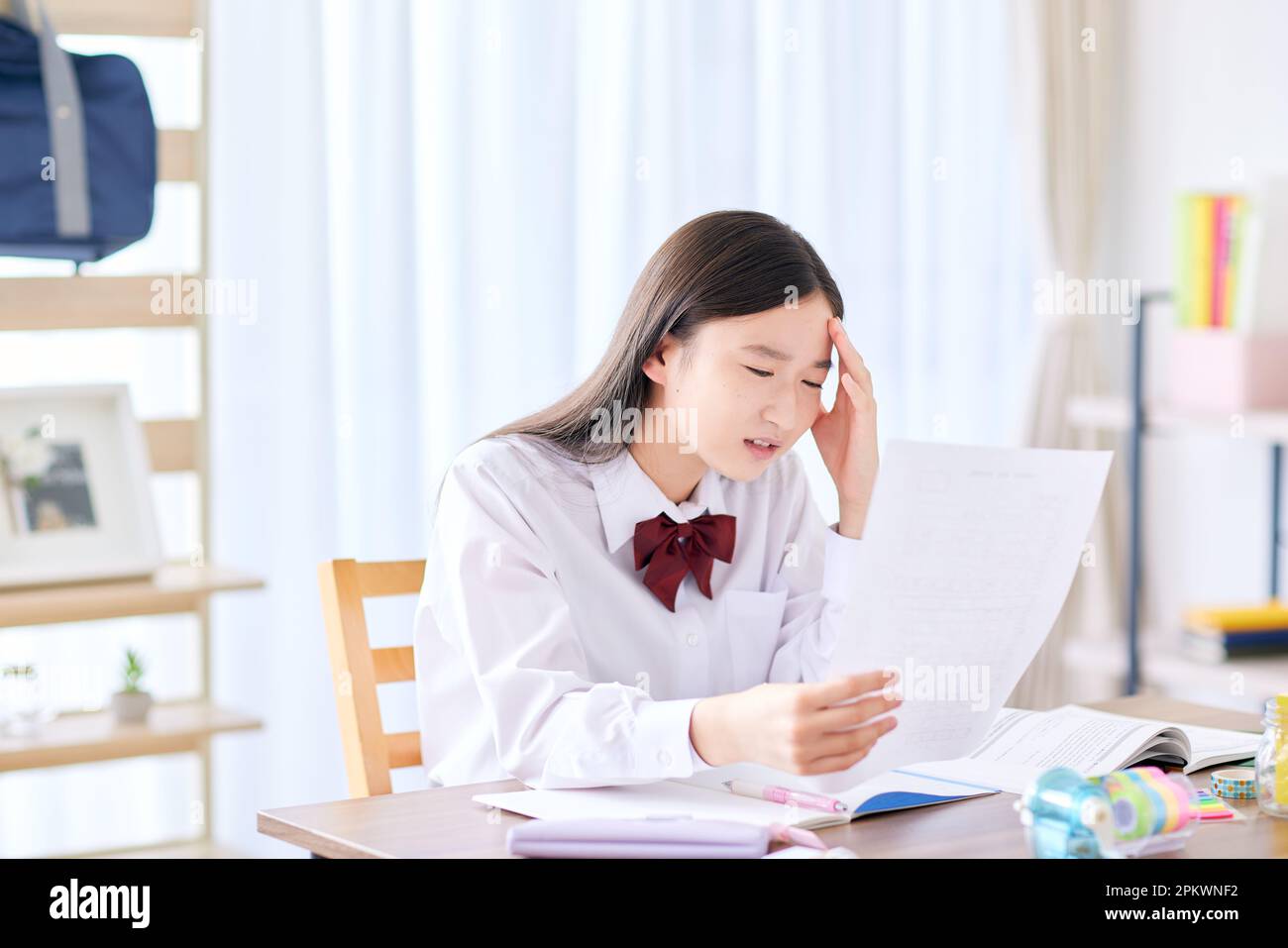 Japanese high school student in uniform studying Stock Photo - Alamy