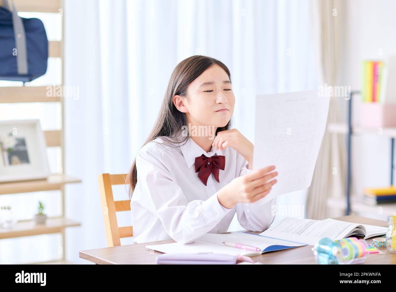 Japanese high school student in uniform studying Stock Photo - Alamy